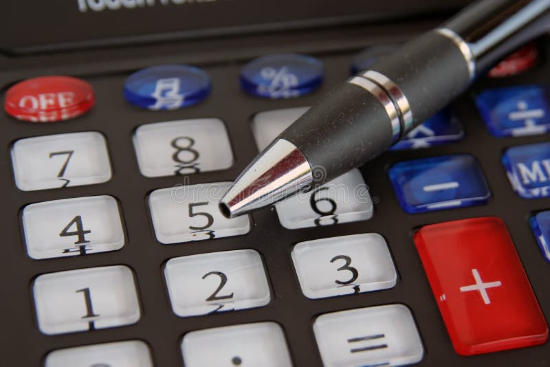 Calculating the Correct Dosage. a Mature Pharmacist Sorting Medication ...