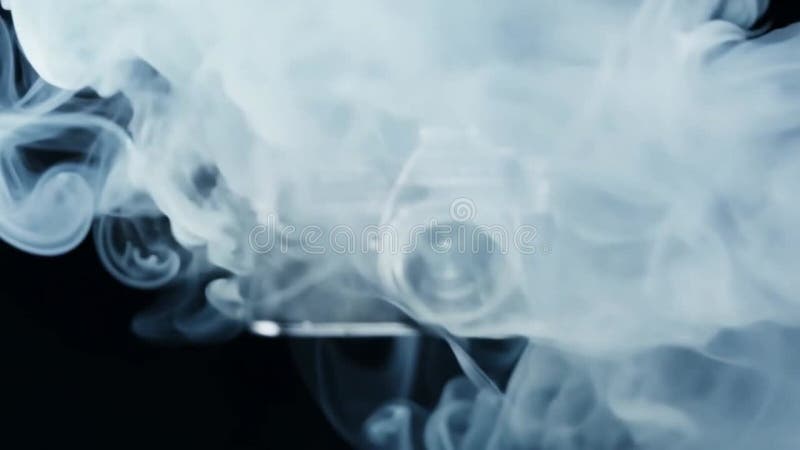 A Vintage Camera Appears Slowly Emerging from a Cloud of White Smoke ...