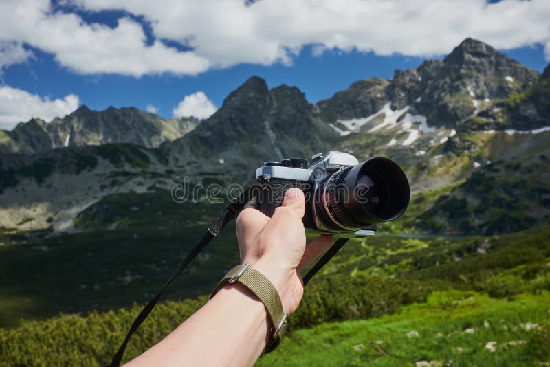 Film Camera on the Background of Mountains Landscape Stock Photo ...
