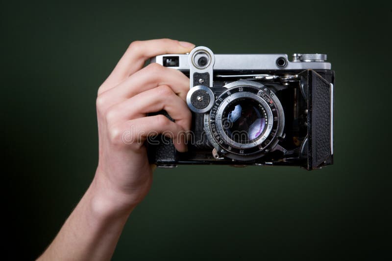 Vintage Polaroid Camera stock image. Image of hands - 170336817