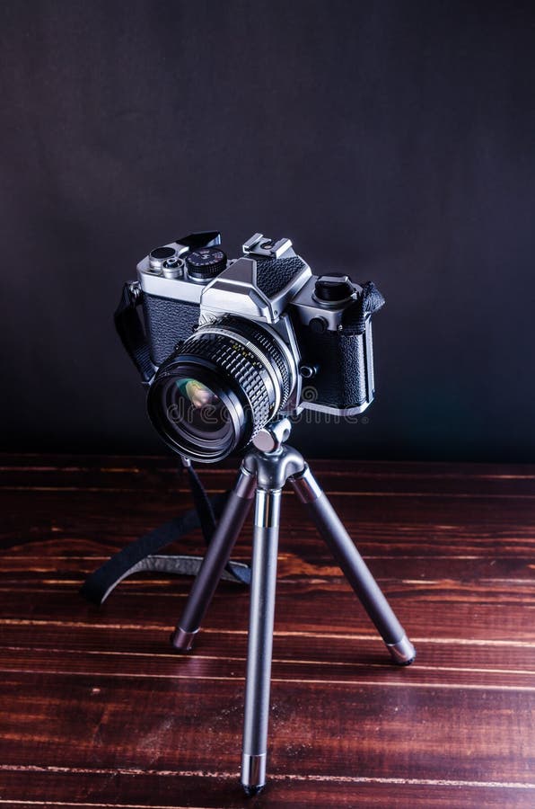 Vintage Camera on Mini Tripod Stock Image - Image of adjustable ...