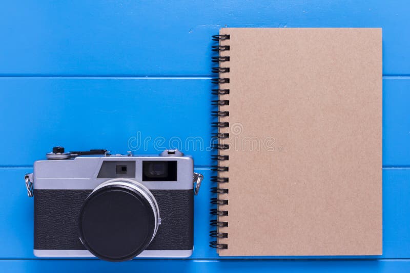 Vintage Camera and Note Book Paper Stock Photo - Image of paper, wood ...