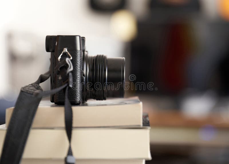 Vintage Camera on a Pile of Books Stock Photo - Image of imagination ...