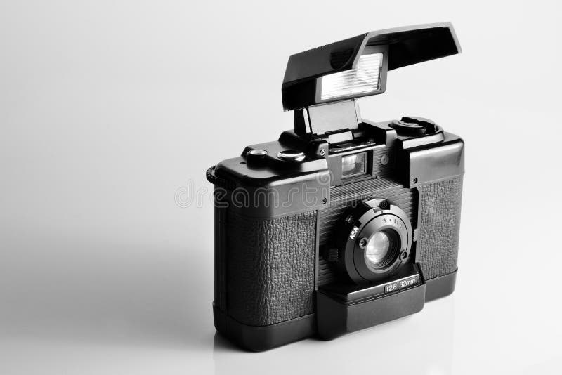 Vintage Camera with Pop-up Flash Stock Image - Image of single, lens ...