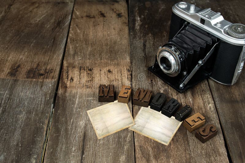Vintage Camera with Snapshots Stock Photo - Image of camera, vintage ...