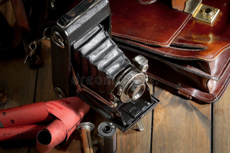 Vintage Camera in the Studio on an Old Background Stock Image - Image ...