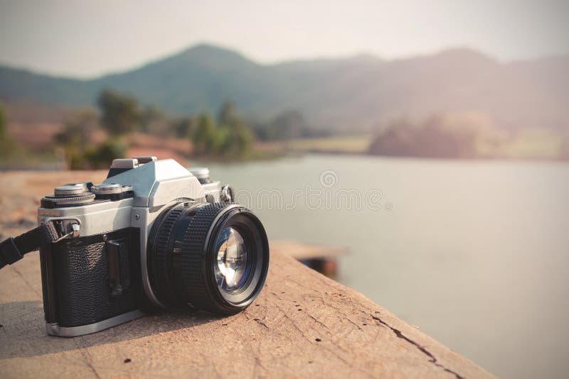 Vintage Camera with View of Lake and Mountain Stock Photo - Image of ...