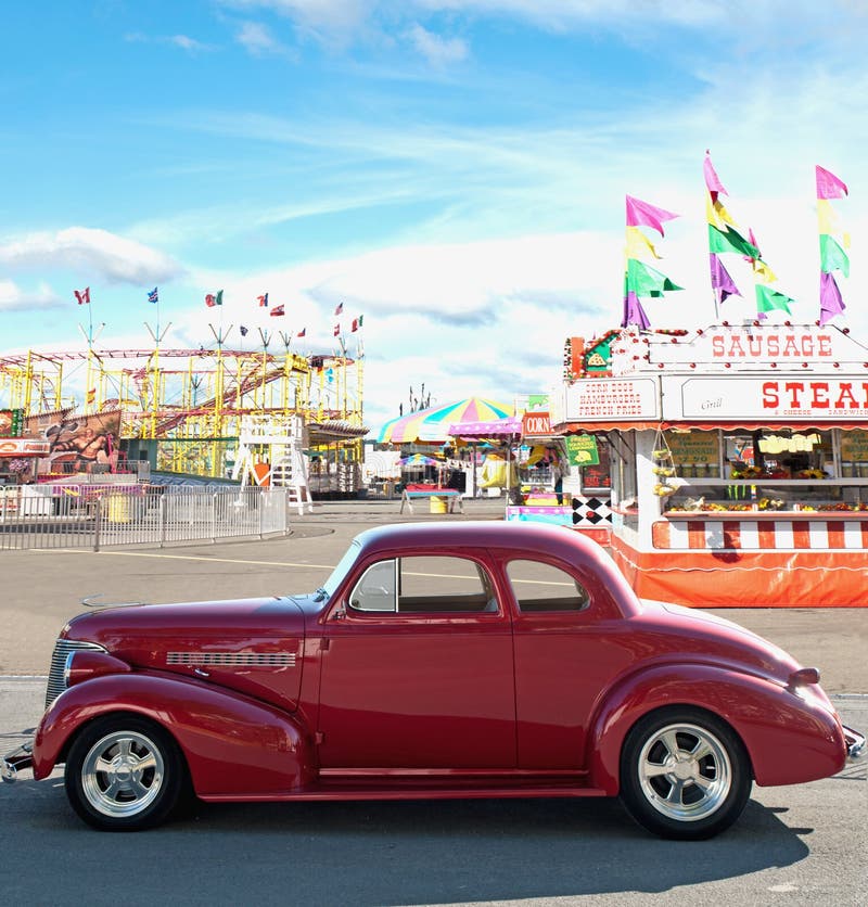 Vintage car and carnival stock image. Image of antique - 21042157