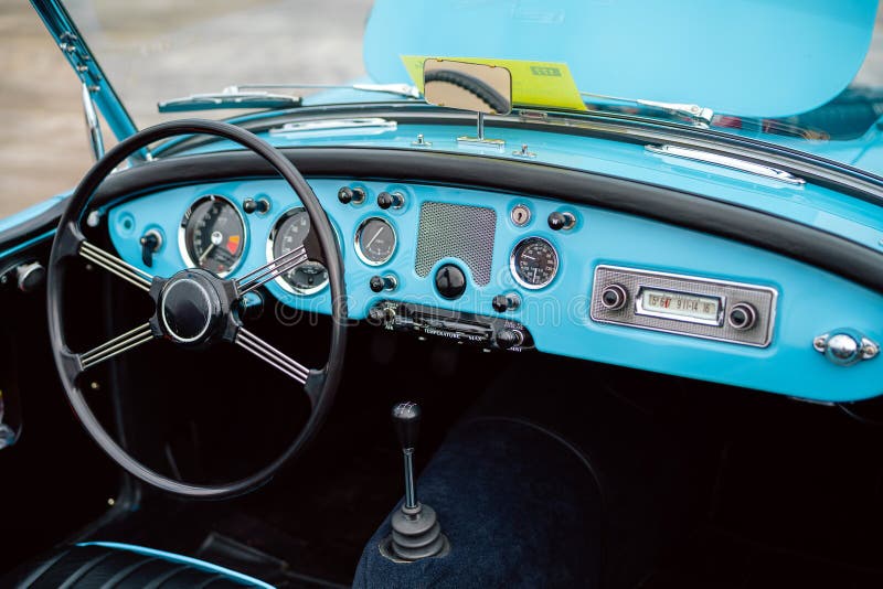 Vintage Car Dashboard with Classic Steering Wheel and Retro Controls ...