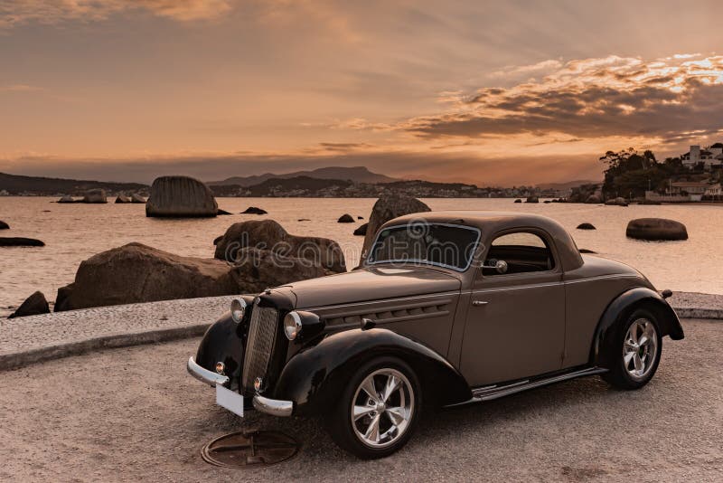 Vintage car 1951 at sunset stock photo. Image of auto - 186977416