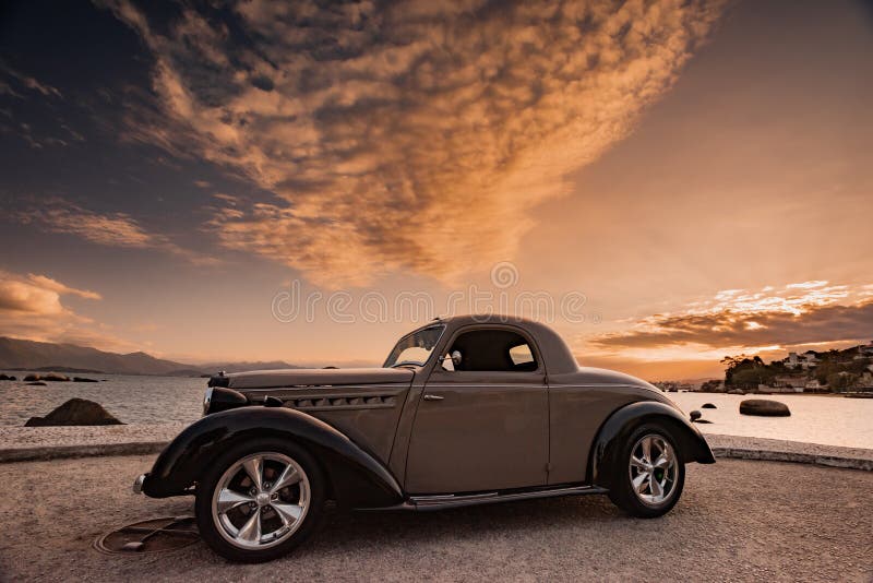 Vintage car 1951 at sunset stock photo. Image of automobile - 186977486
