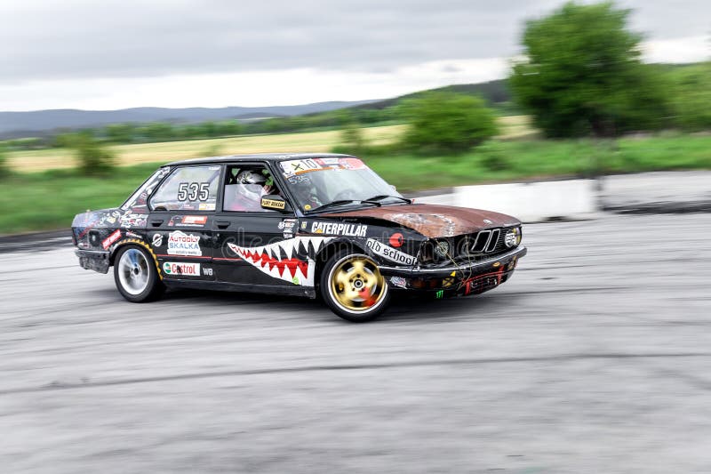 Vintage Car with Teeth Motif Speeding on Racetrack Editorial Stock ...