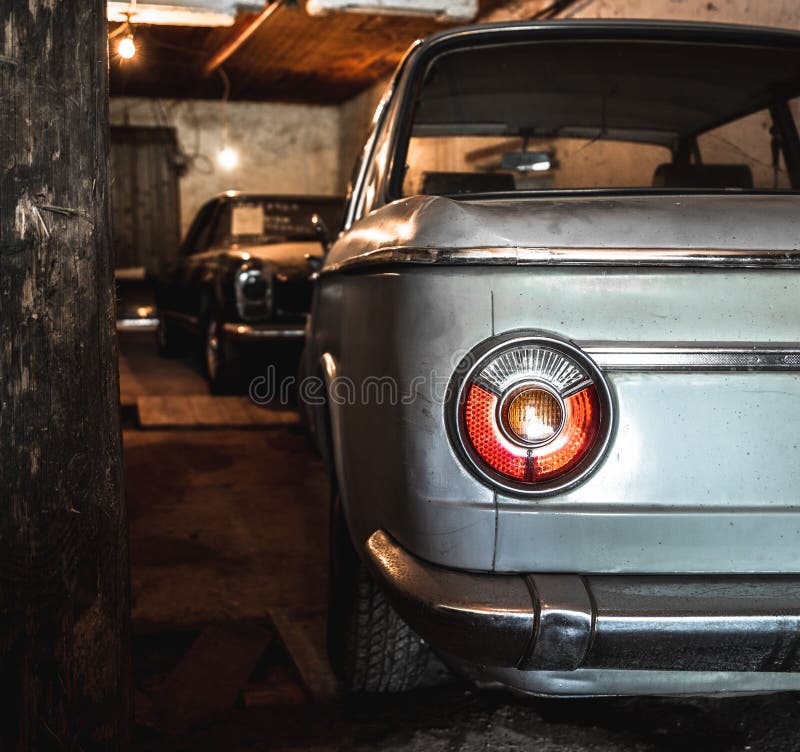 Vintage Cars Parked in a Dark Storage Stock Image - Image of cars ...