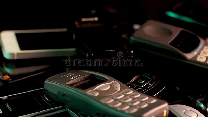 Old Vintage Cellular Mobile Phones from 1990s and 2000s. Spinning Close ...