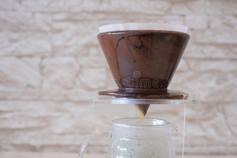 Vintage Ceramic Coffee Dripper on the Dripper Stand and Coffee Water ...