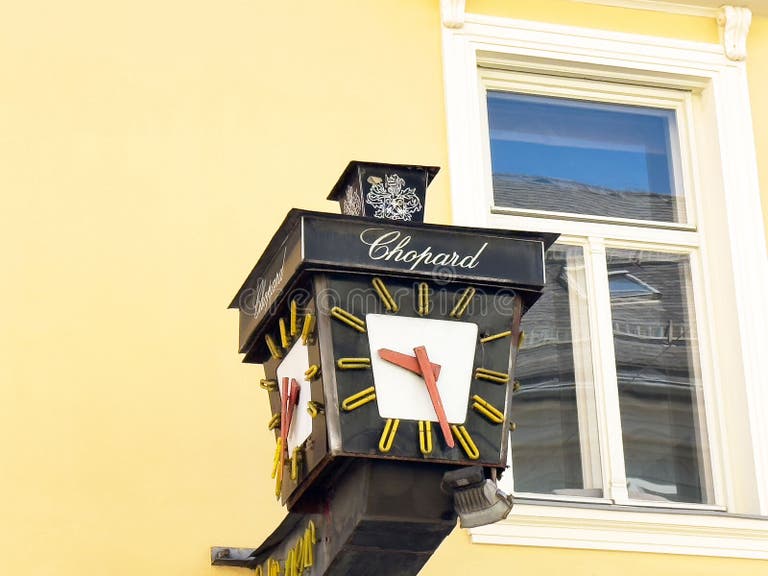 Vintage Chopard Clock on Yellow Building with Window Editorial ...