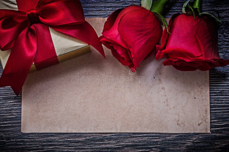 Vintage Clean Paper Red Bloomed Roses Wrapped Gift Stock Image - Image ...