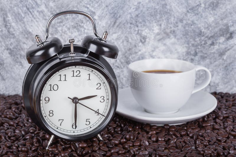 Vintage Clock and Coffee in Cup Coffee Time Concept with Wall Stock ...