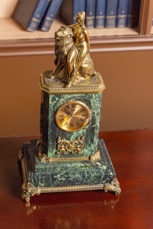 Vintage Vintage Clock Stand on a Wooden Table. Shallow Depth of Field ...