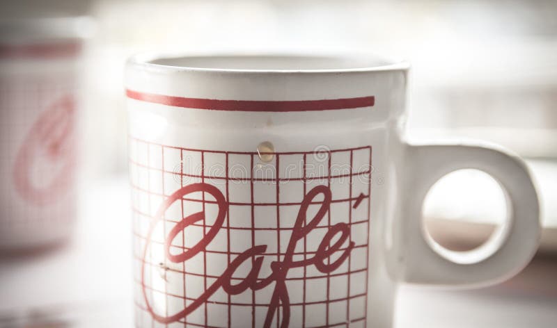 Vintage Coffee Mug on White Table with Sunlight through Window Stock ...