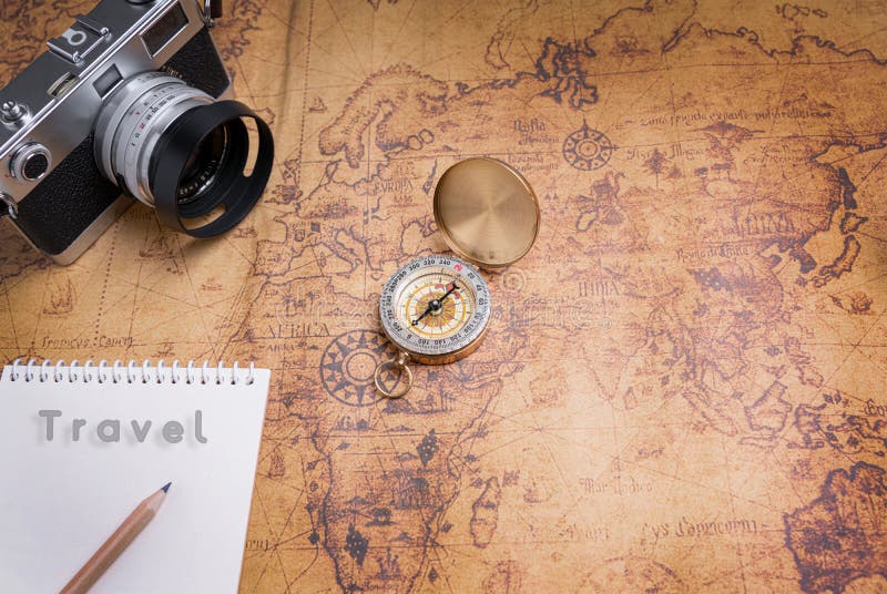 Vintage Compass and Camera on Map for Travel Planning Stock Photo ...