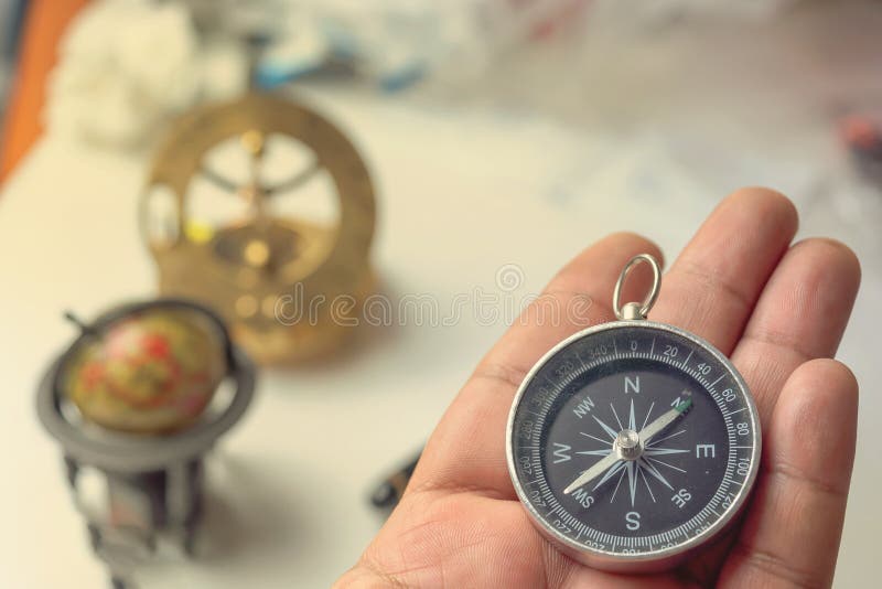 Vintage compass in hand stock photo. Image of navigation - 132756022