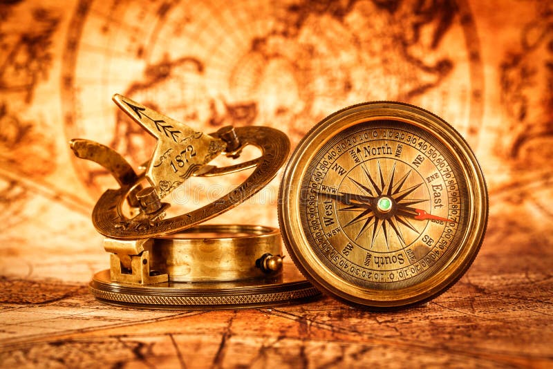 Vintage Compass Lies on an Ancient World Map. Stock Photo - Image of ...