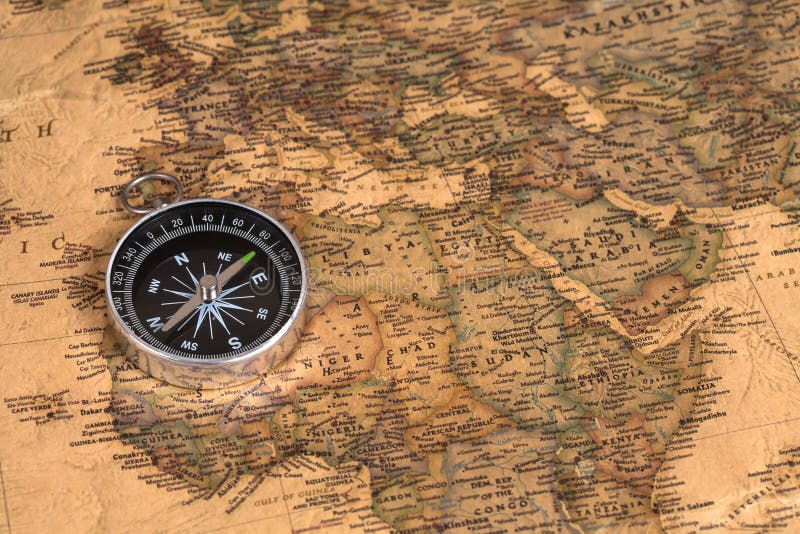 Vintage compass on old map stock image. Image of bygone - 72643199