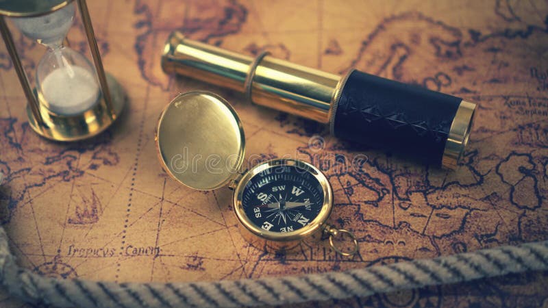 Vintage Compass and Other Nautical Equipment on Ancient World Map Stock ...