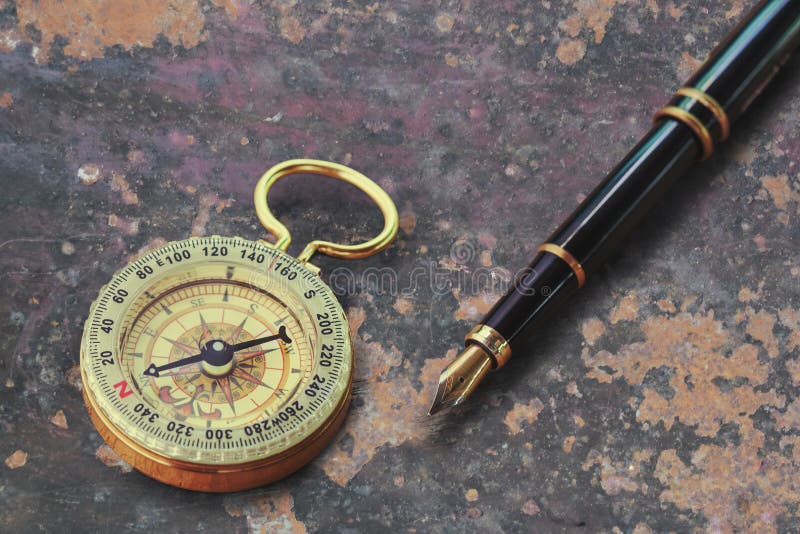 Vintage Compass and Pen on Dirty Rust Stock Image - Image of floor ...