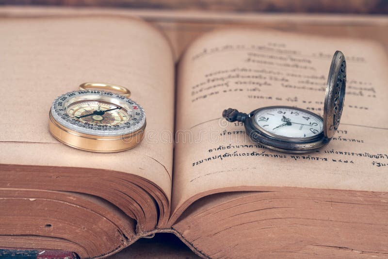 Vintage Compass and Pocket Watch on Books. Stock Image - Image of ideas ...