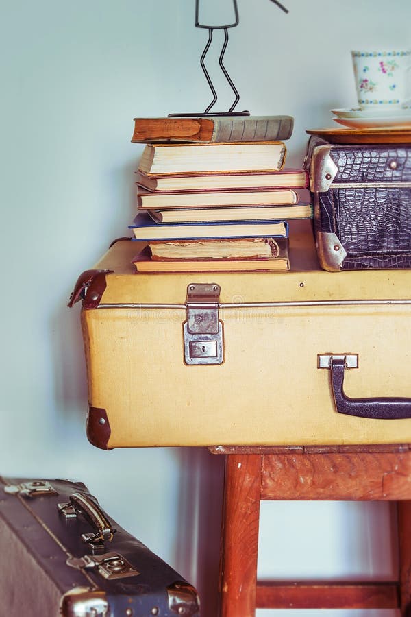 Vintage Composition with Old Books, Suitcases and Stool. Toning Stock ...