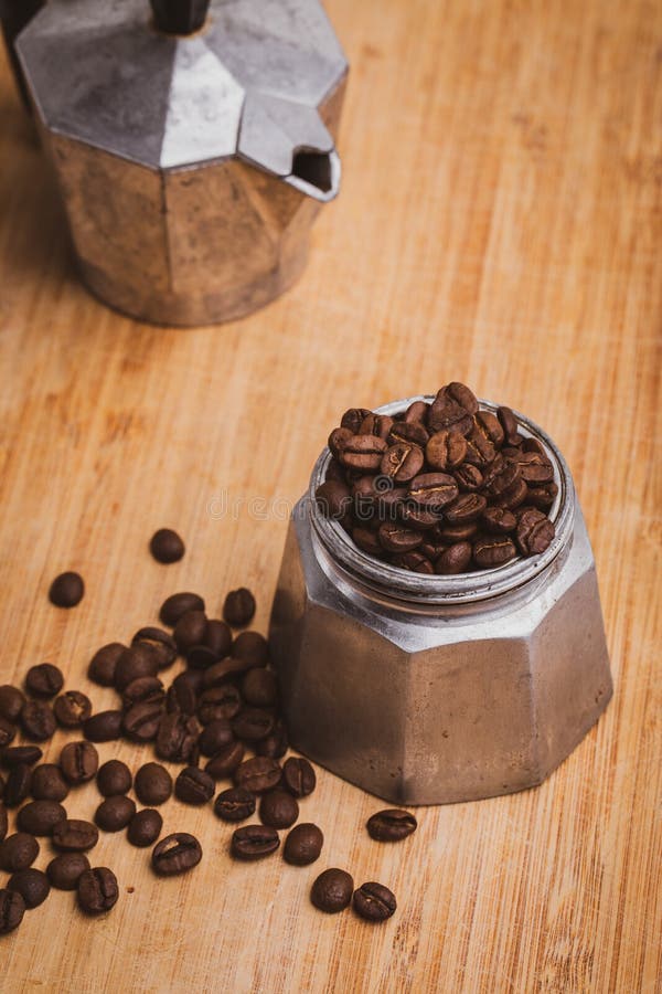 Vintage Concept of Mocha Pot and Coffee Beans on the Table. Stock Image ...