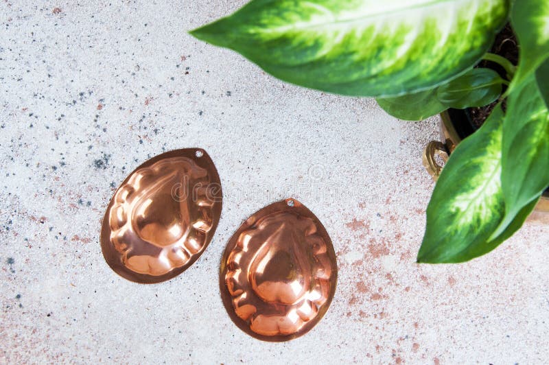 Vintage Copper Molds on a Concrete Background. Stock Photo - Image of ...