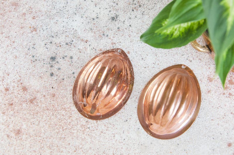Vintage Copper Molds on a Concrete Background. Stock Photo - Image of ...