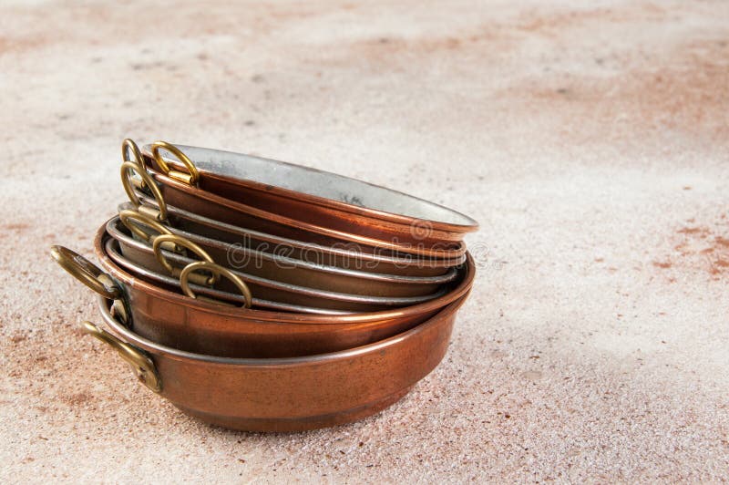 Vintage Copper Molds on a Concrete Background. Stock Image - Image of ...