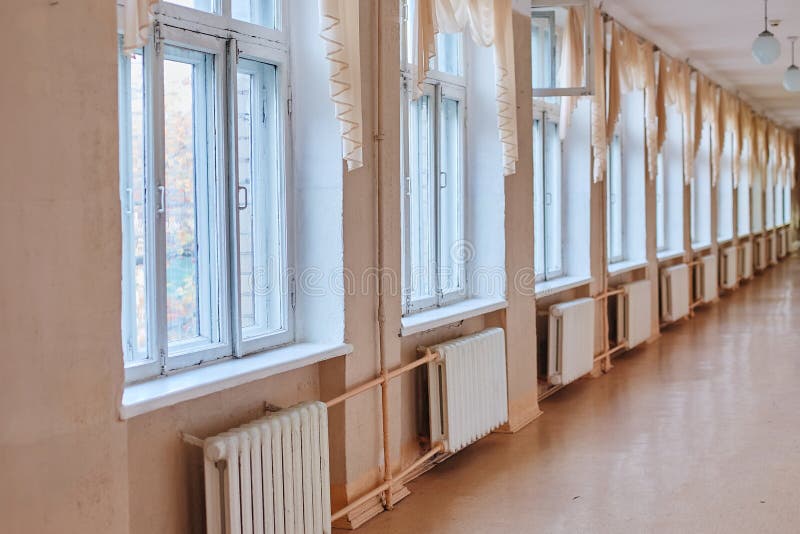 Vintage Corridor Inside the School Building. with Cast Iron Batteries ...