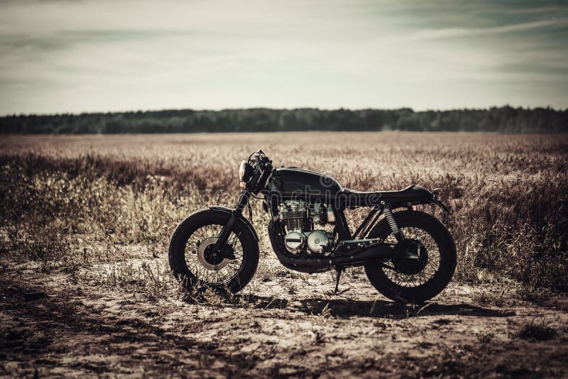 Vintage Custom Motorcycles in Field Stock Photo - Image of leather ...