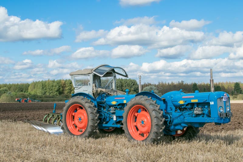 A Vintage Doe Triple-D Tractor Pulling a Plough Editorial Photo - Image ...