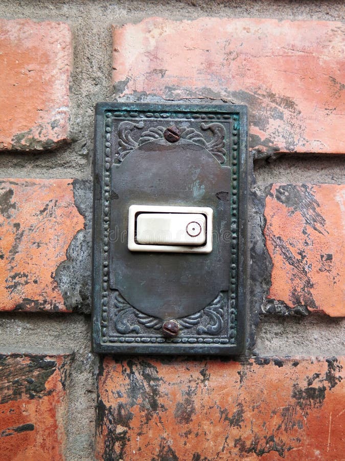 Old Vintage Doorbell on the Door Knockers in the Form of a Shovel Stock ...