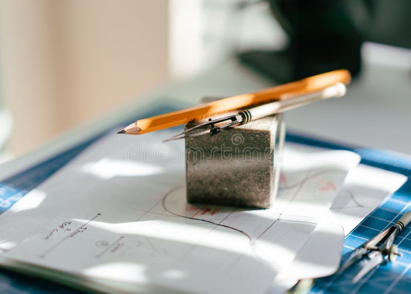 Vintage Drawing Tools Laying on a Stack of Paper Stock Photo - Image of ...