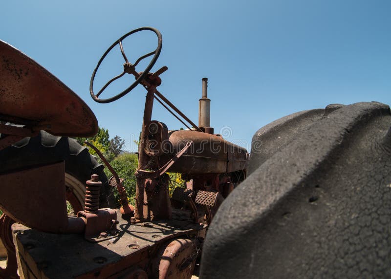 Vintage early farm tractor stock image. Image of environment - 152597619