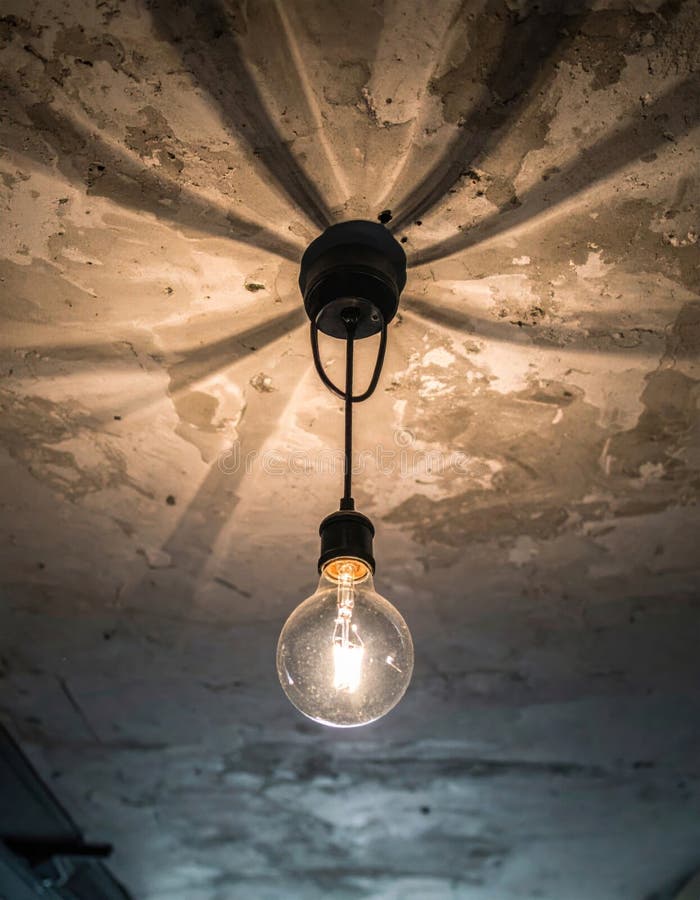 Vintage Edison Bulb Hanging Lamp with Shadow Patterns on Grunge Ceiling ...