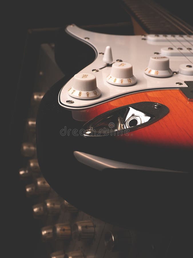 Vintage Electric Guitar on an Old Guitar Amplifier Stock Photo - Image ...