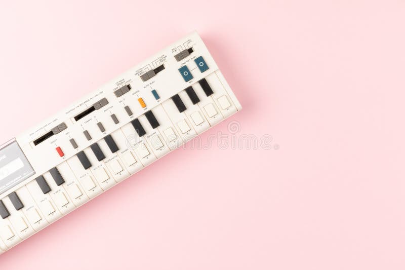 Vintage Electronic Keyboard Synth Piano on Pink Background Stock Image ...