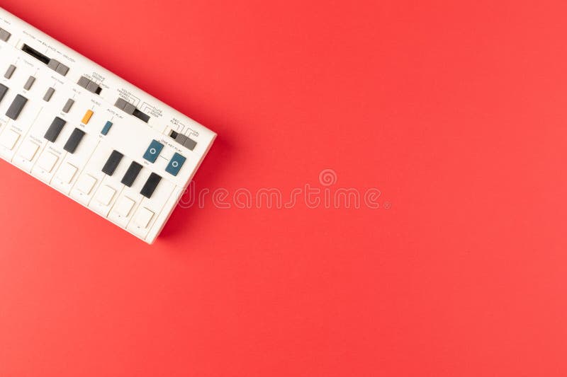 Vintage Electronic Keyboard Synth Piano on Red Background Stock Photo ...