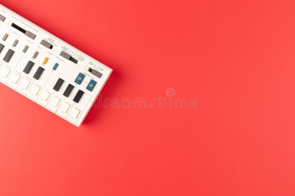 Vintage Electronic Keyboard Synth Piano on Red Background Stock Photo ...