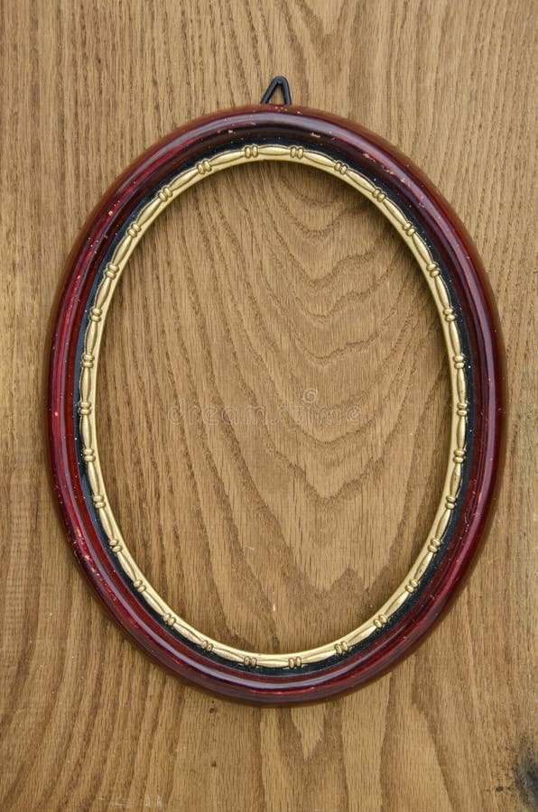 Vintage Empty Oval Picture Art Frame on Oak Plank Stock Image - Image ...
