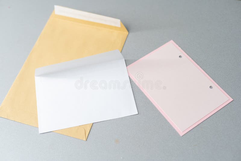 A Vintage Envelope with a Piece of Paper Stock Photo - Image of note ...