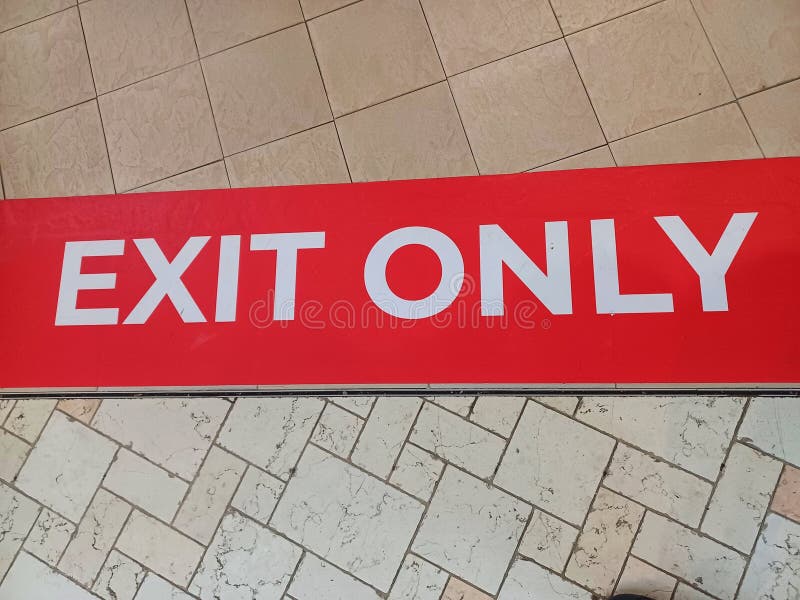 Red and White Exit Sign,exit only Sign on Floor Stock Photo - Image of ...